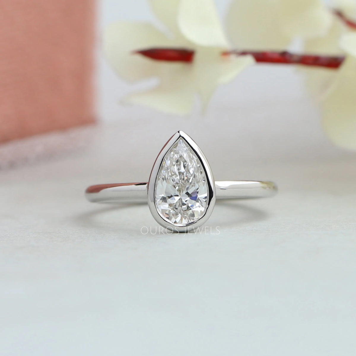 Pear Shaped Diamond Bezel Set Ring — Ouros Jewels